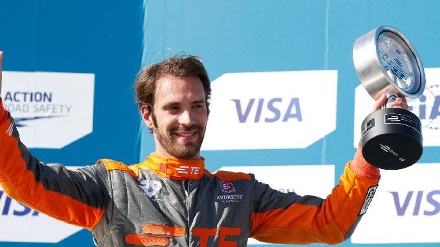 Charging Vergne pleased with third